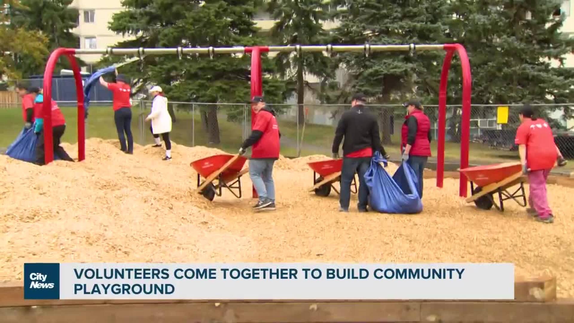 Volunteers help build community playground in Dixon Park