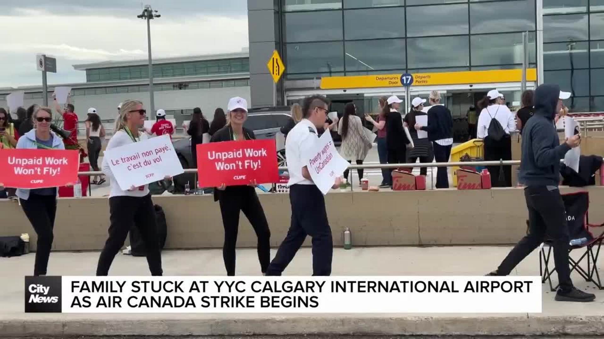 Family stuck at YYC Calgary International Airport as Air Canada strike ...