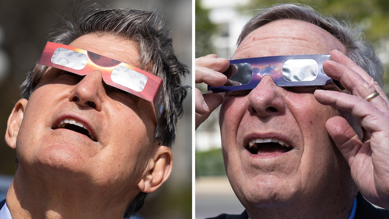 Manchin, Durbin view eclipse outside the Capitol - POLITICO