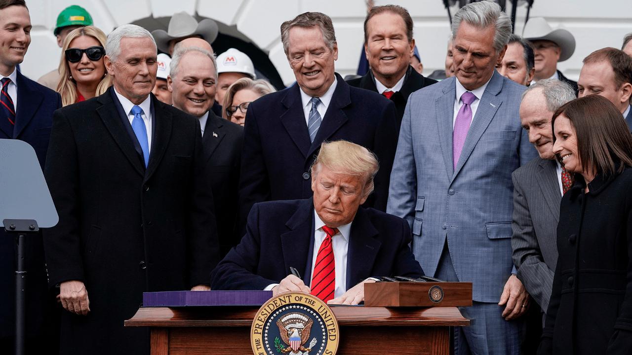 Trump signs USMCA trade agreement into law - POLITICO