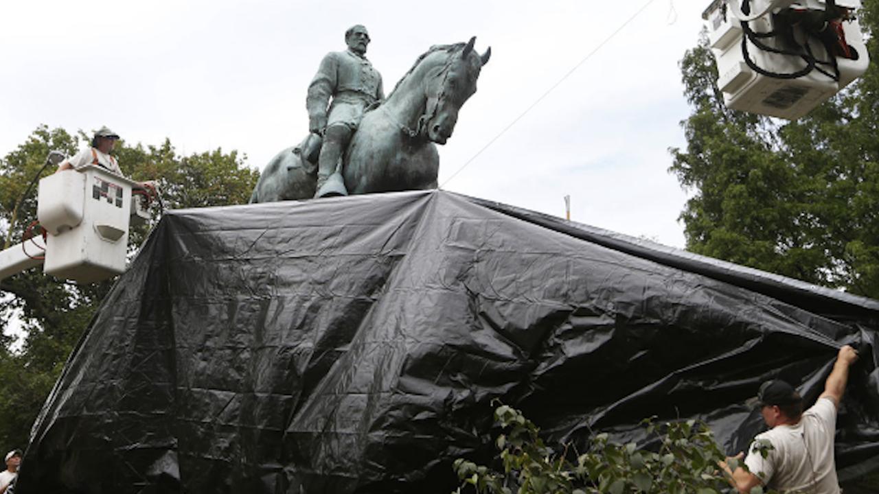 Charlottesville covers Confederate statues with black shrouds - POLITICO