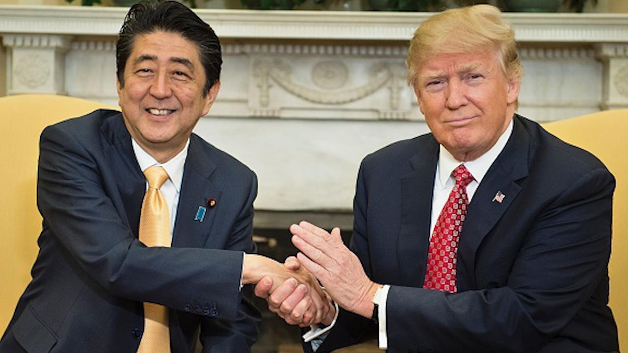 Abe and Trump shake hands for 19 seconds - POLITICO