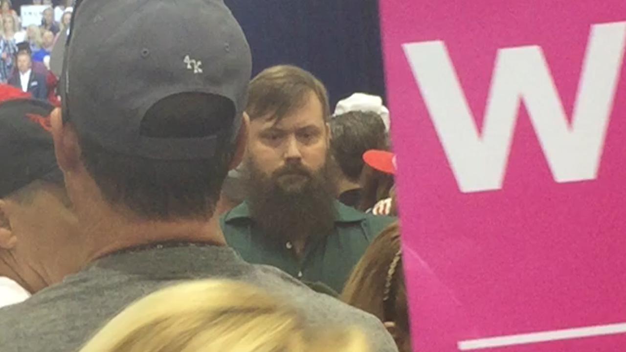 Man with menacing stare says he was actually protesting Trump - POLITICO