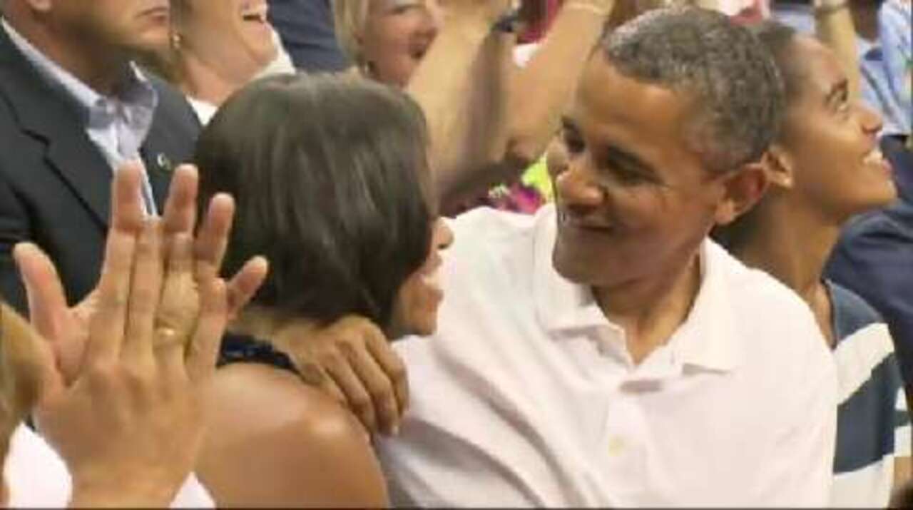 Obamas on 'Kiss Cam' - POLITICO