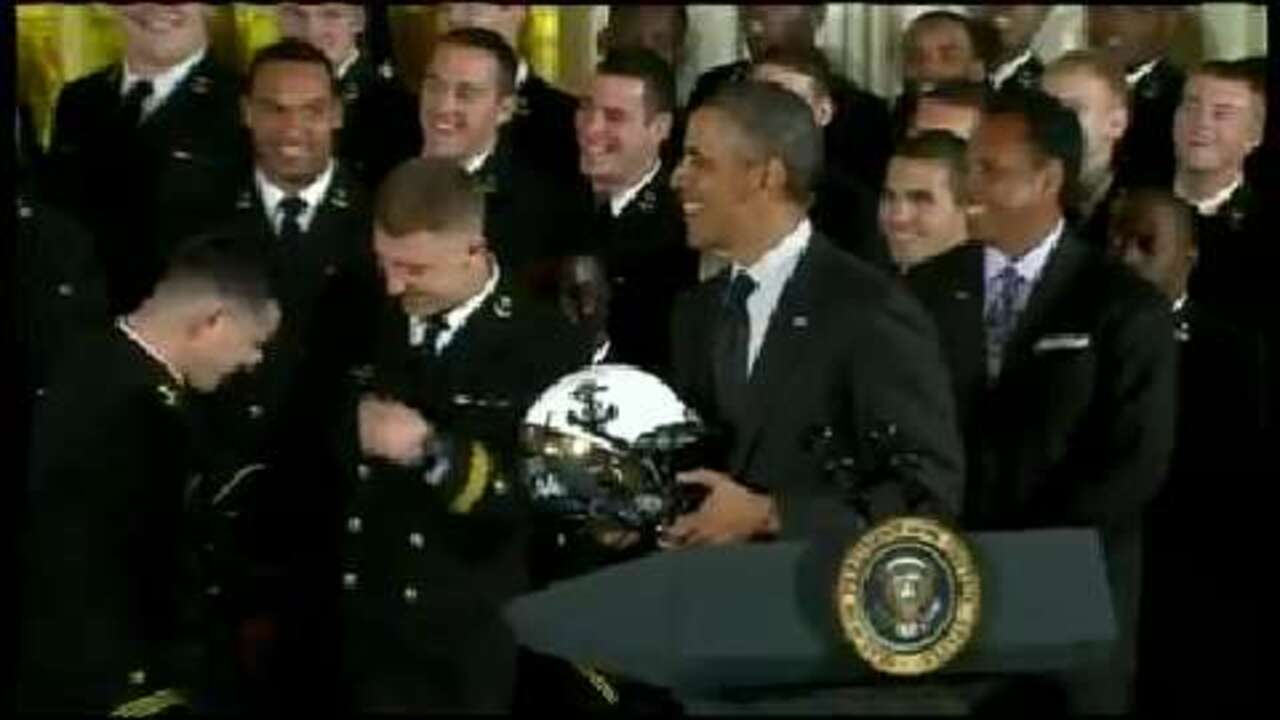Obama presents Commander-in-Chief trophy to Naval Academy football team ...
