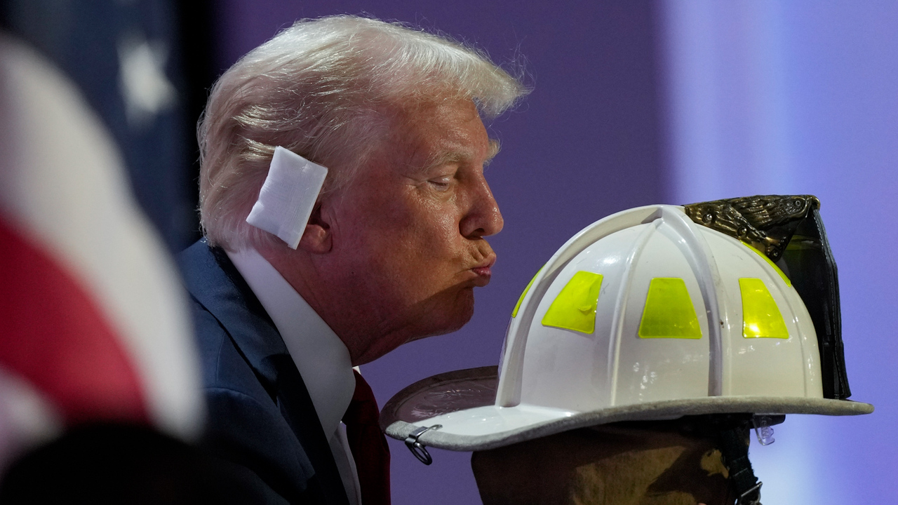 Trump kisses rally shooting victim's firefighter gear - POLITICO
