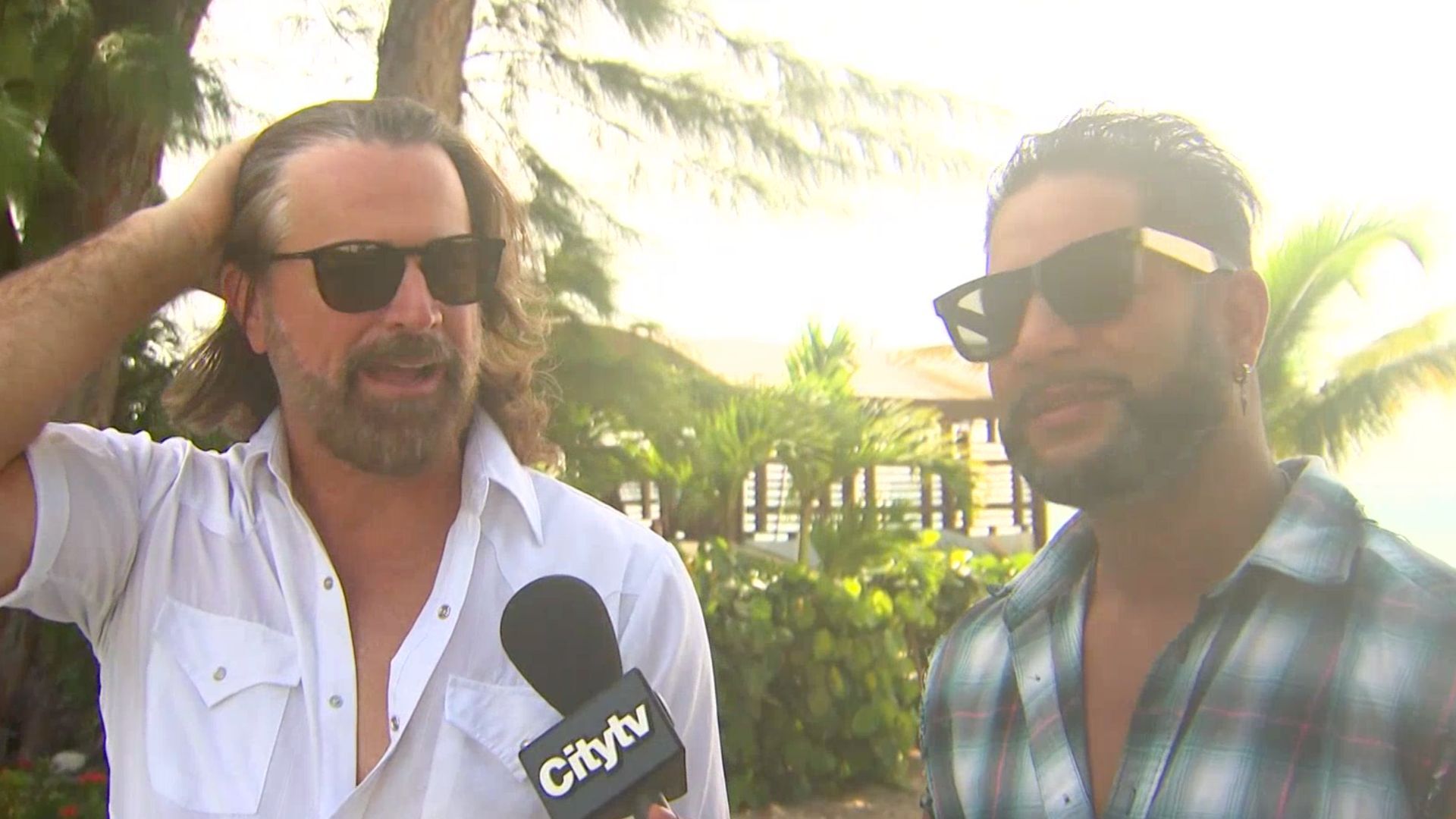 Devo is LIVE in the Cayman Islands with country music star Chris ...