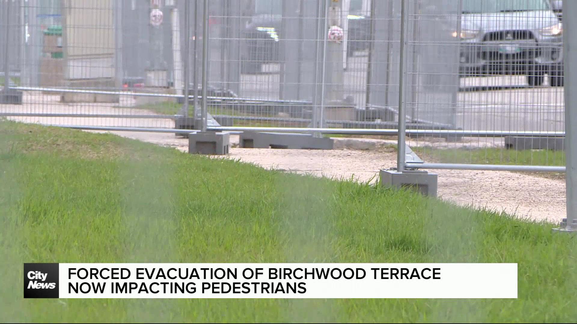 'Really unsafe' potential collapse of building forces pedestrians into ...