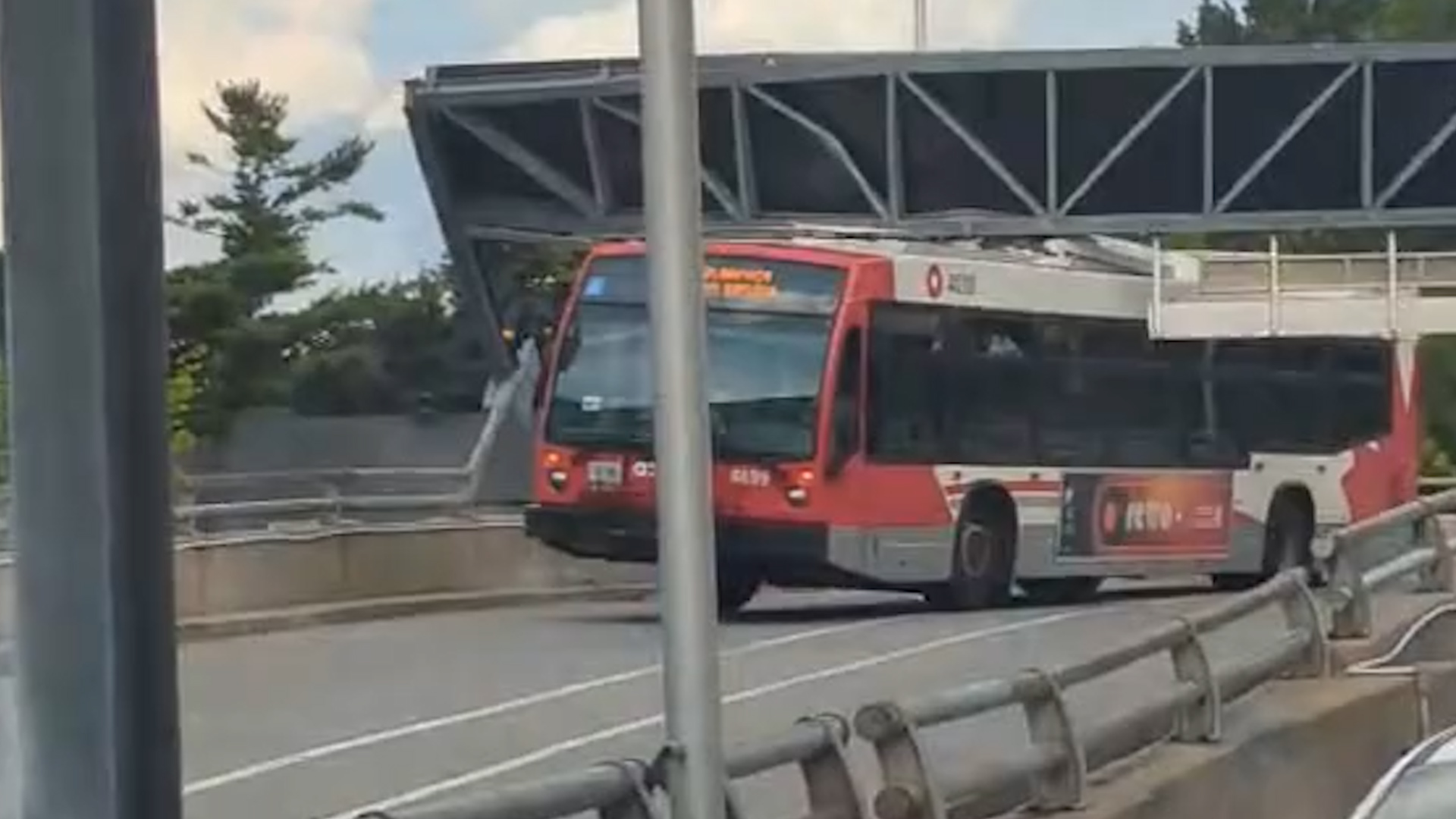 ON CAM: OC Transpo bus drives into mall overhead sign