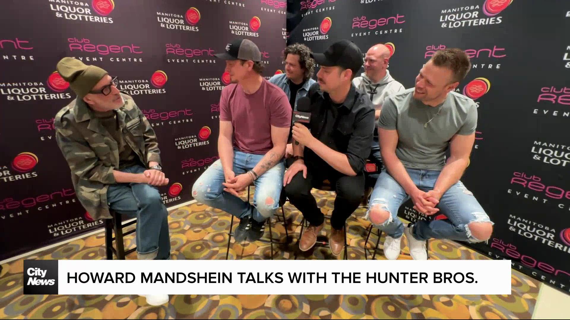 Howard Mandshein talks with the Hunter Brothers.