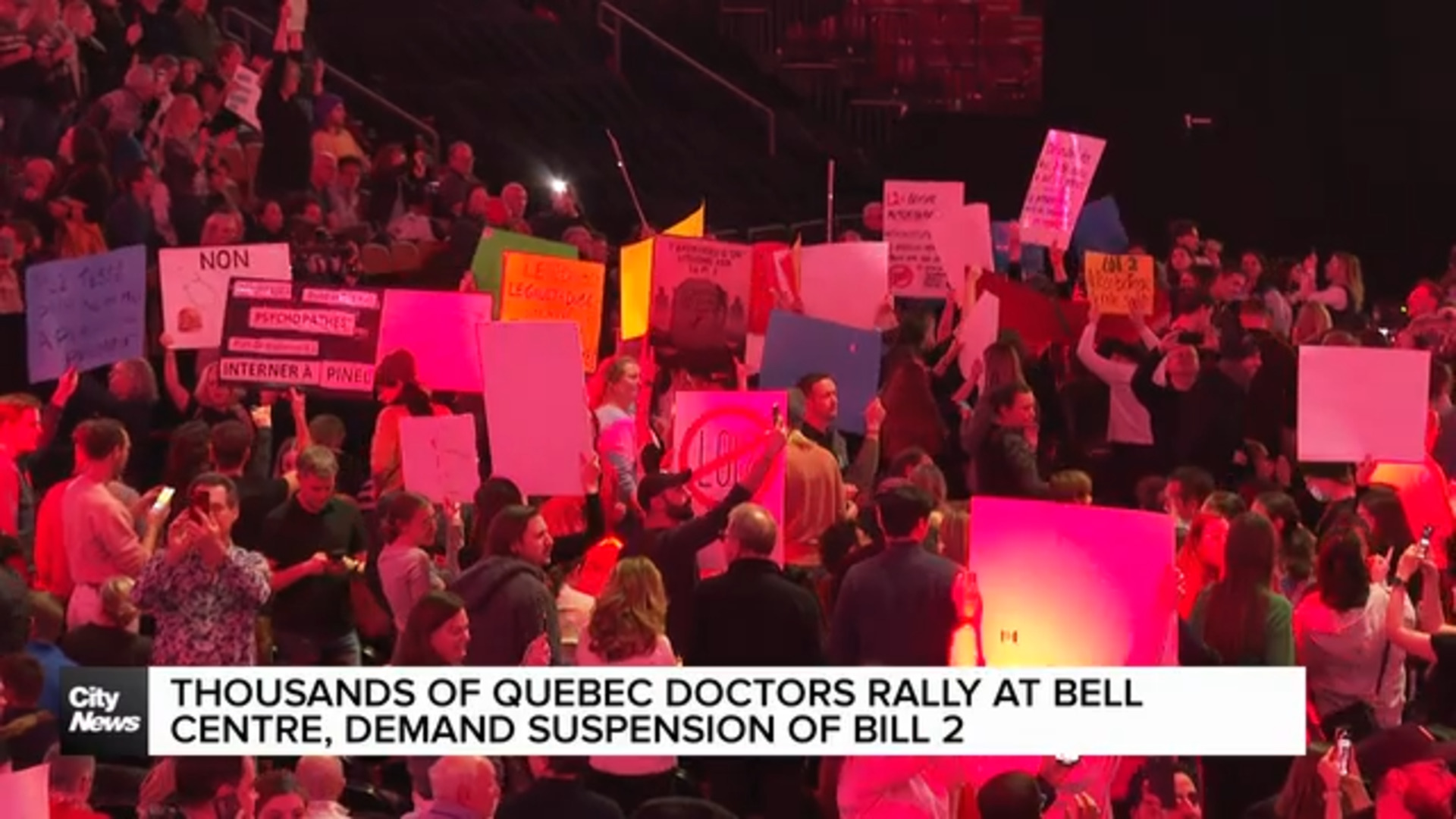 Thousands of Quebec doctors rally at Bell Centre to protest Bill 2