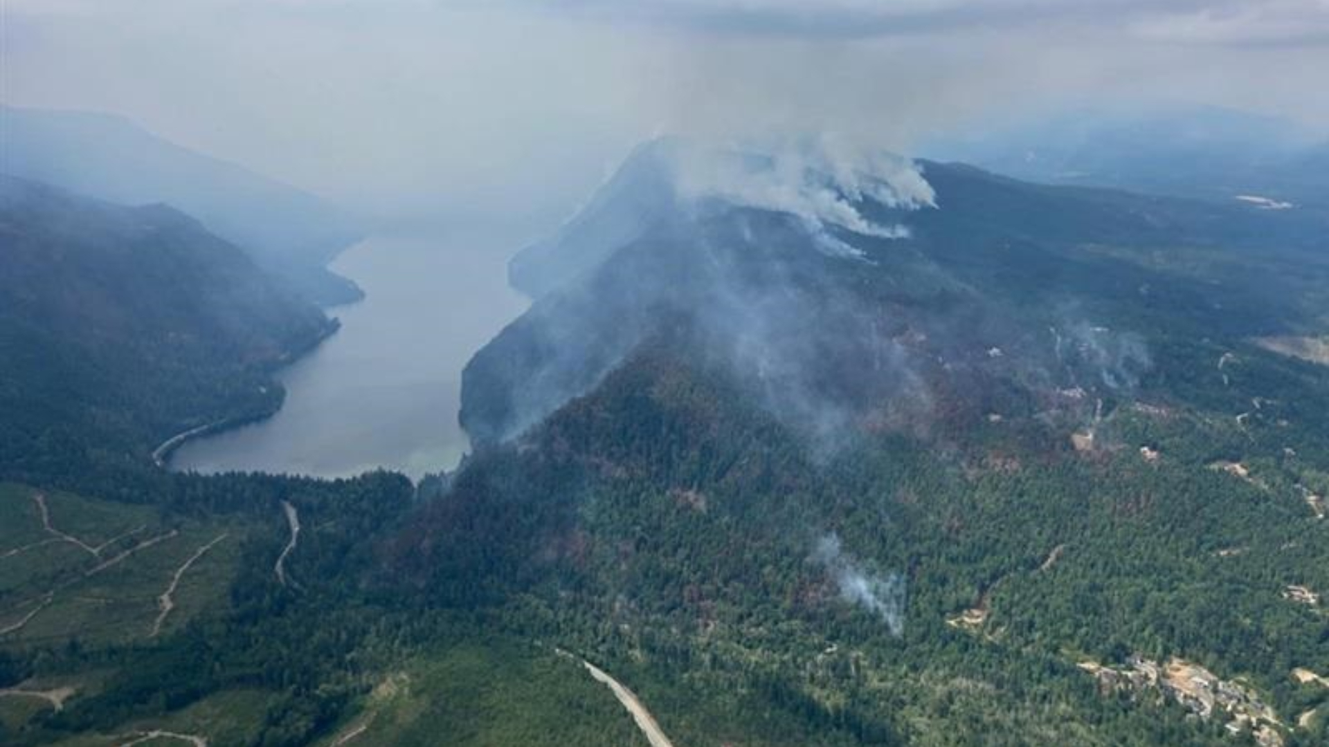 Rain, cool weather helps firefighters battling Wesley Ridge wildfire