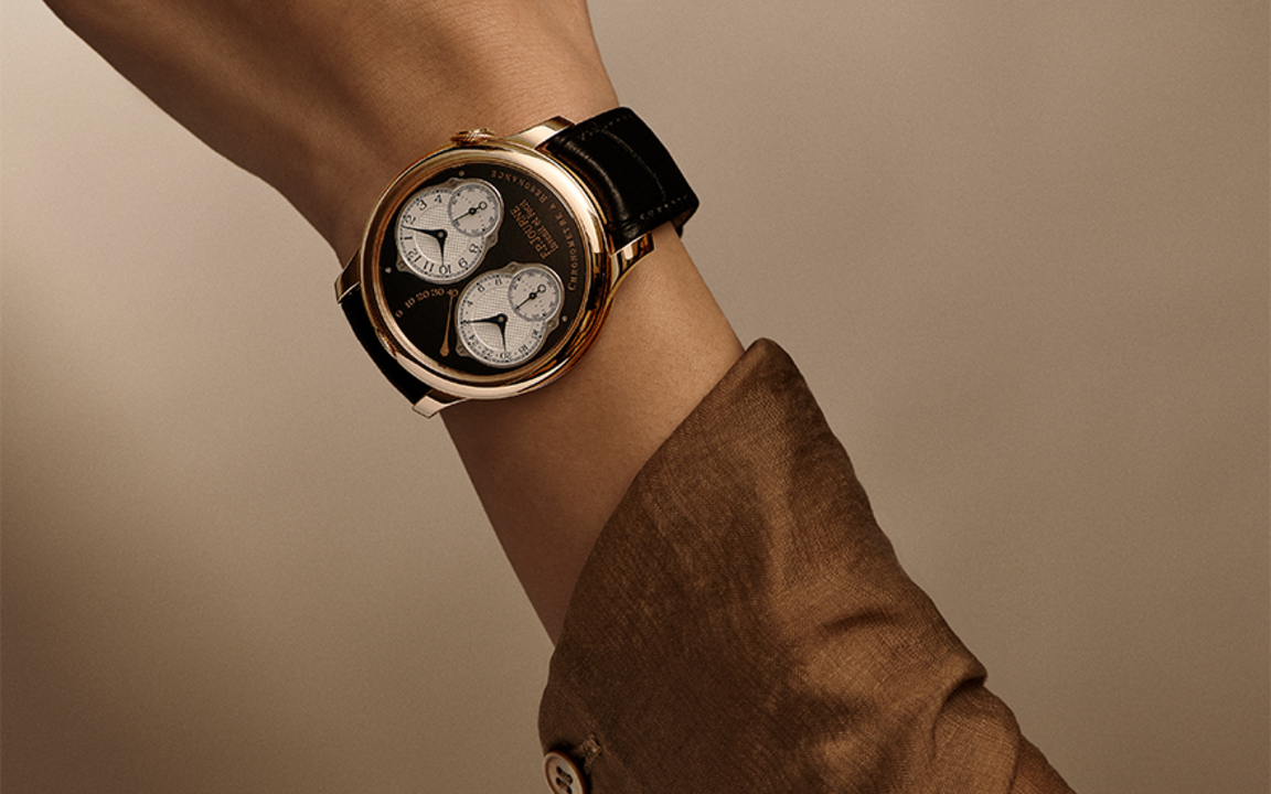 SWISS. A LARGE GILT AND ENAMEL OPENFACE DUPLEX WATCH WITH CENTRE ...