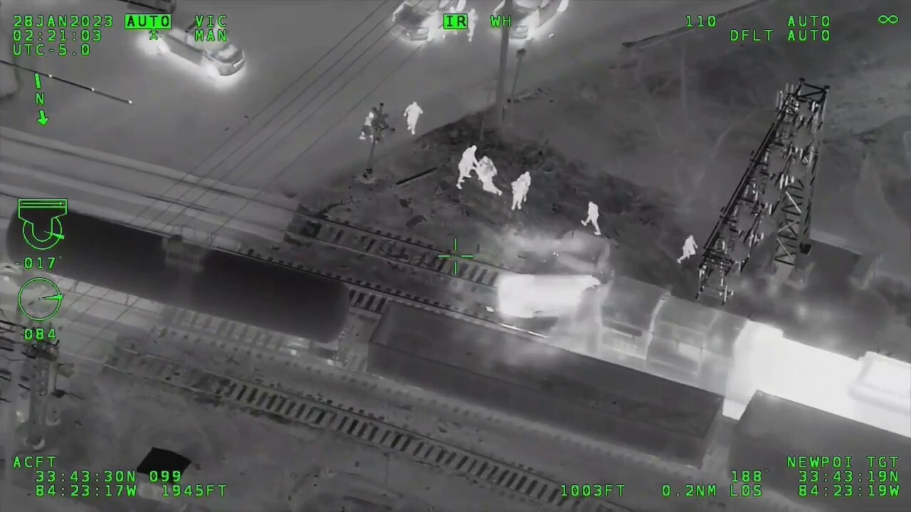 Atlanta Police Rescue Suspect Trapped In Stolen Cop Car From Oncoming